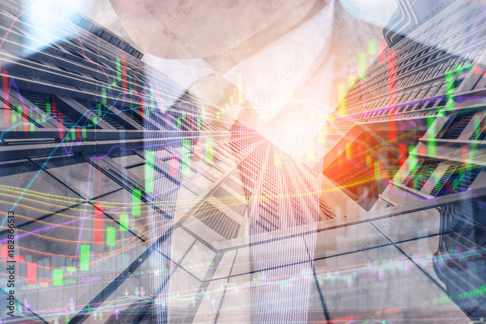 double exposure with city building with stock market financail chart ...