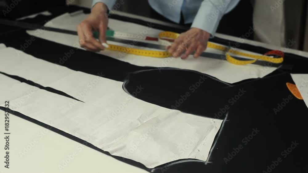 Designer dress in working clothes to cut out. Stock Video | Adobe Stock