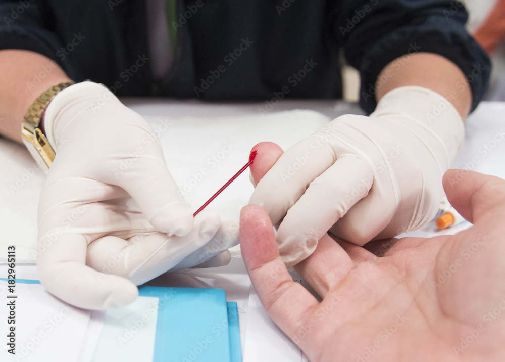 blood drop for blood testing.Nurses collect blood from blood donor for ...