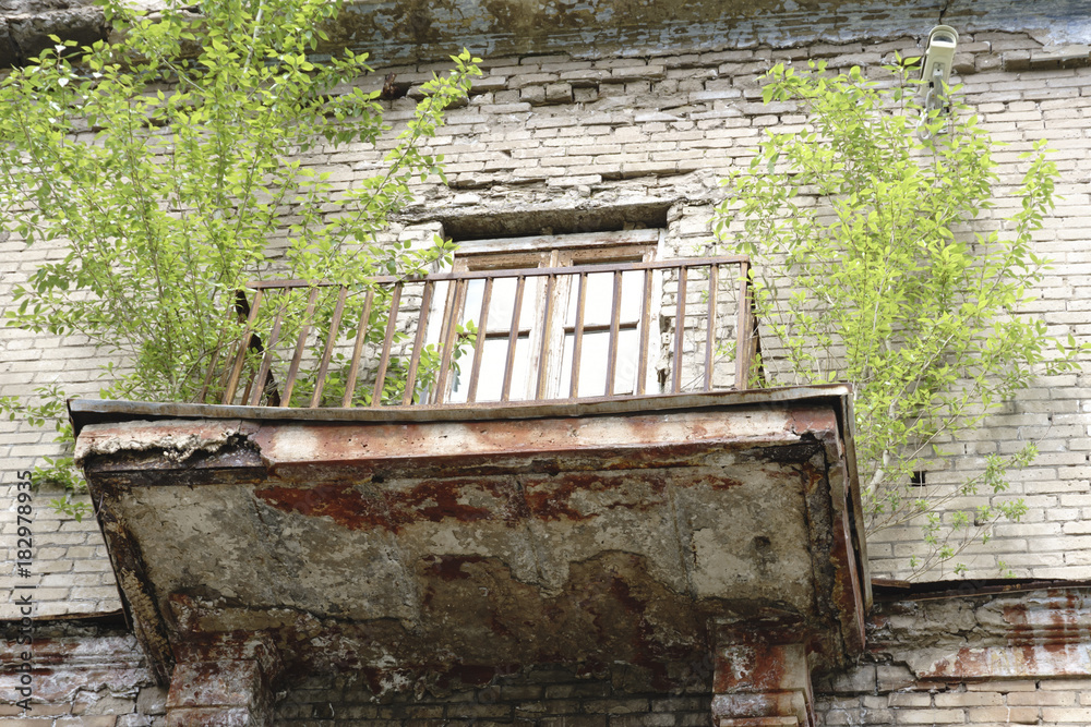 settled crumbling buildings with broken Windows Stock Photo | Adobe Stock