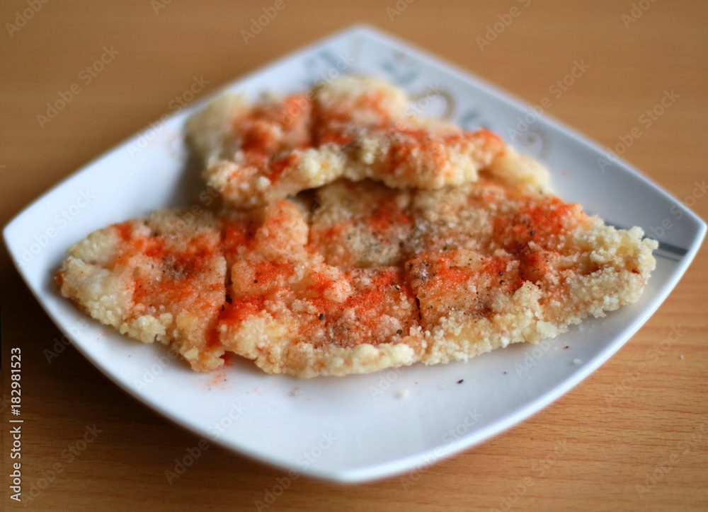 Shihlin crispy chicken with wood background. One of the original hawker ...