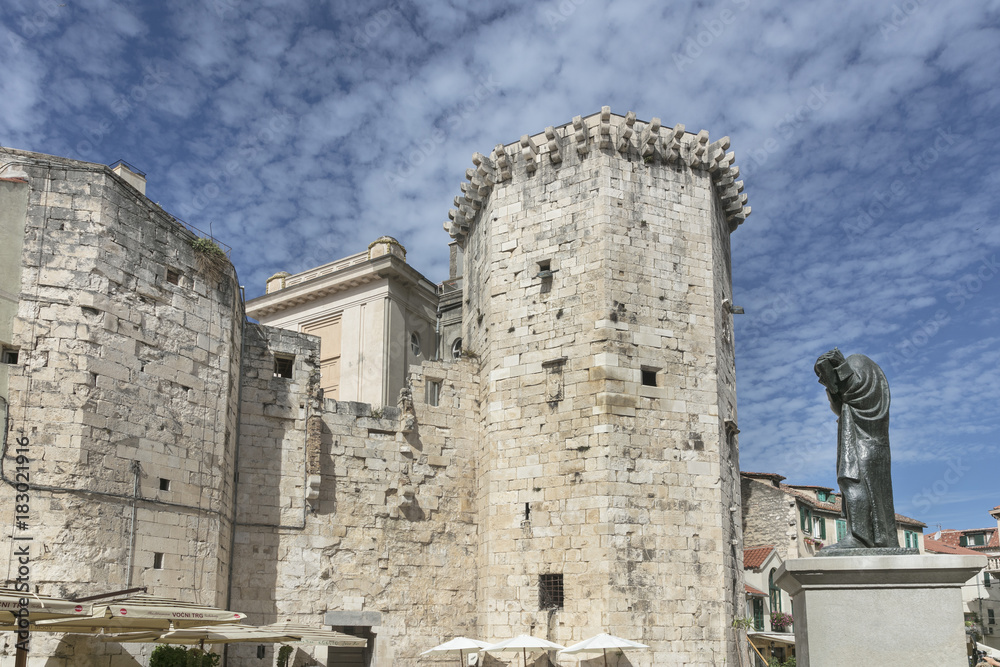Statue of the Croatian poet Marko Marulic on the. Brace Radic Square in ...