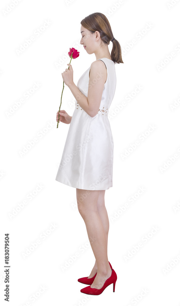 Side view of beautiful woman holding a single red rose flower. Stock ...