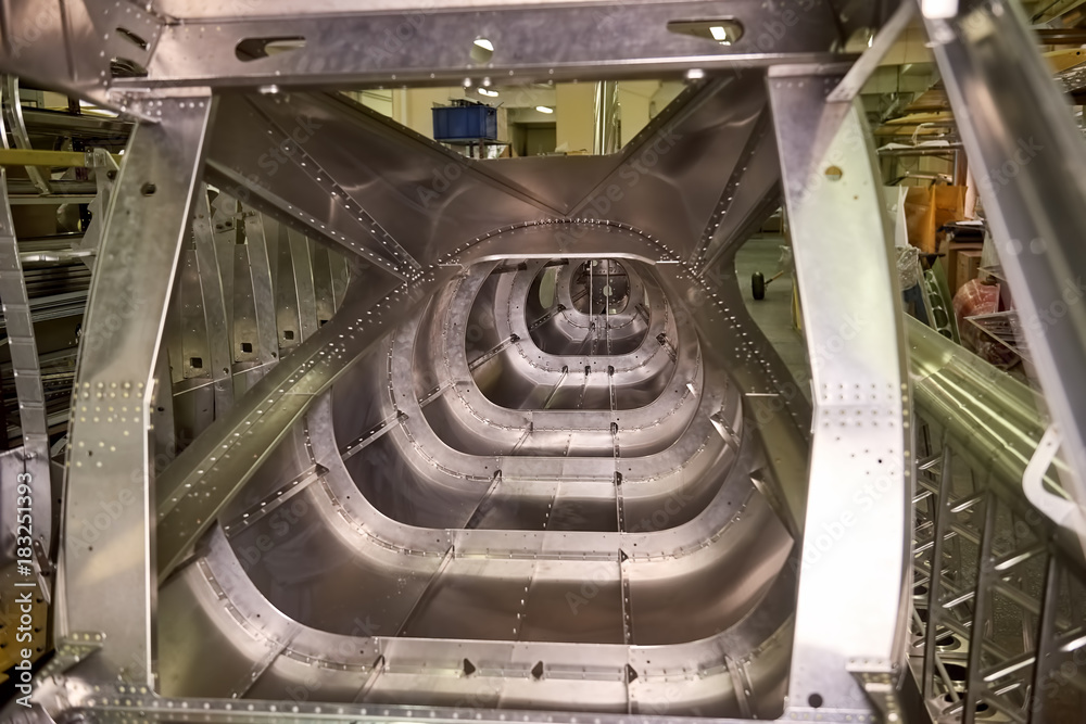 Light aircraft body part, workshop. Production of an airplane. Stock ...