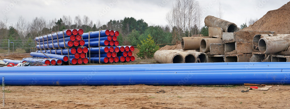 Long blue plastic pipes for the restoration of the old decayed sewage ...