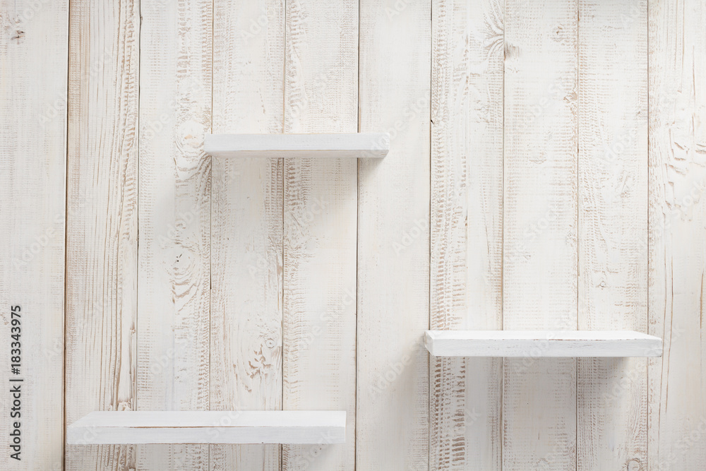 set of wooden shelves on wall background Stock Photo | Adobe Stock