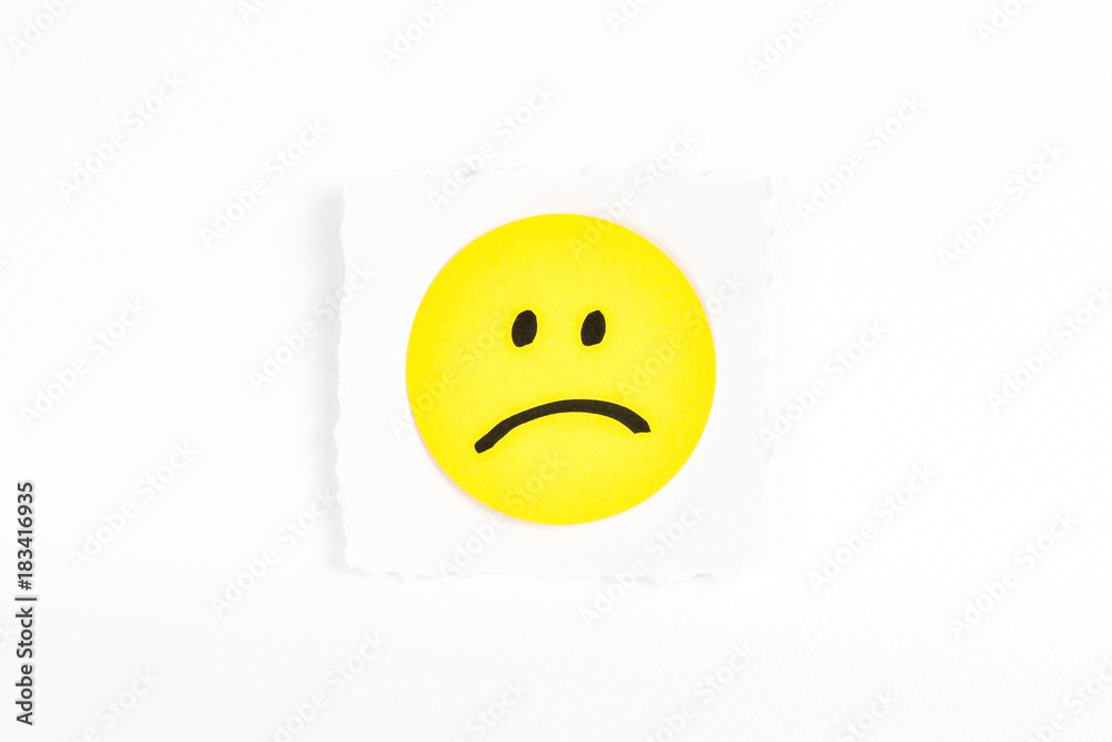 Frowning face emoji note message on white background paper desk Stock ...