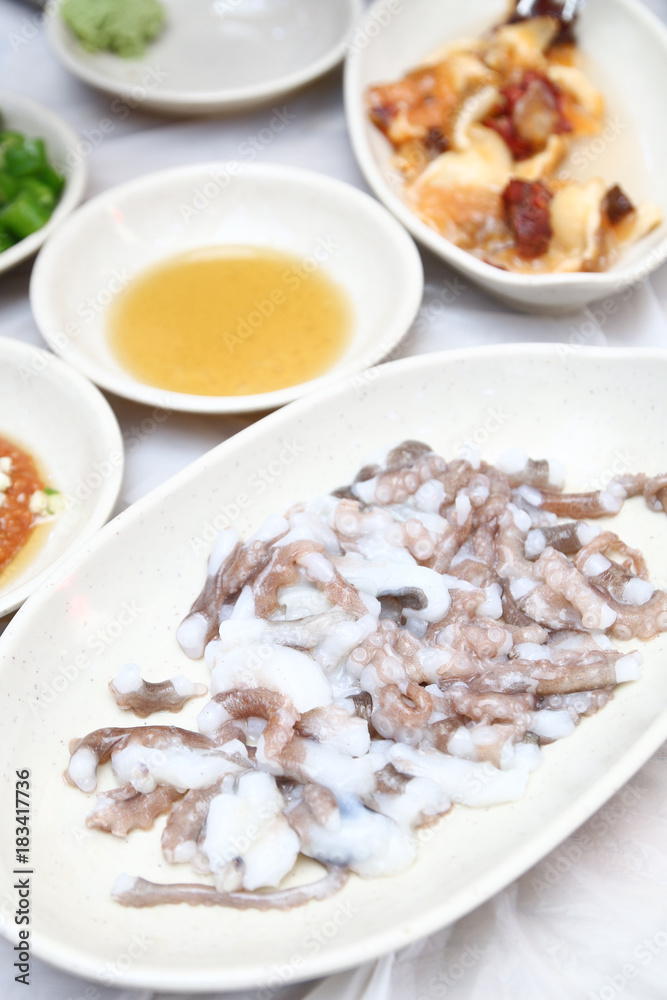 Korean sannakji (Raw Octopus tentacles) meal. Octopuses are often ...