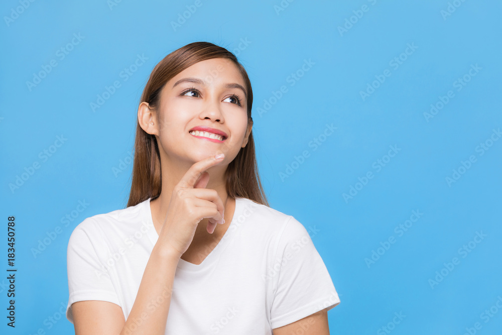 Young girl thinking something. Stock Photo | Adobe Stock