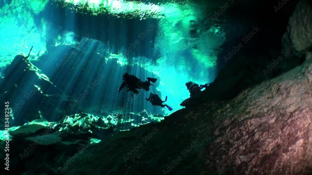 Scuba diving in caves of Yucatan cenotes underwater. Clean and clear ...