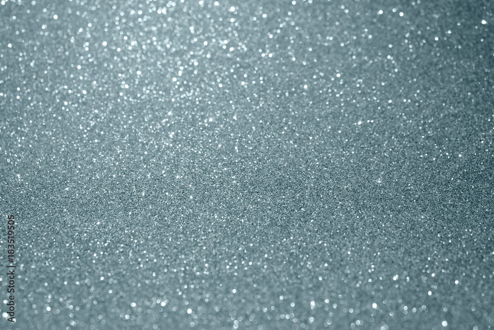 Silver glitter and sparkling blur bokeh light effect on snow white ...