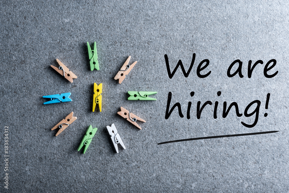 WE ARE HIRING - job recruiting advertisement represented by texts on ...