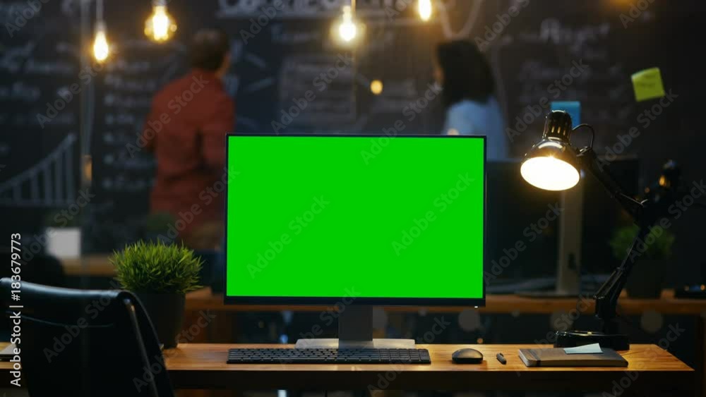 Personal Computer with Mock-up Green Screen Monitor Stands on the ...