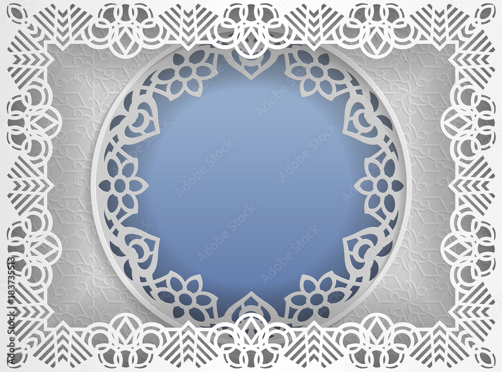 Round white frame in an rectangular frame with lace edges and a ...