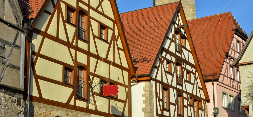 German architecture. Ancient half-timbered houses with red tile roofs ...