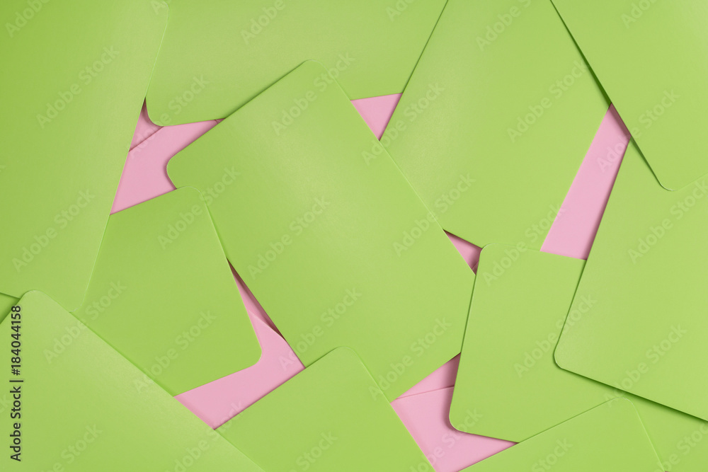 The colorful background from paper lime green and pink flashcards ...