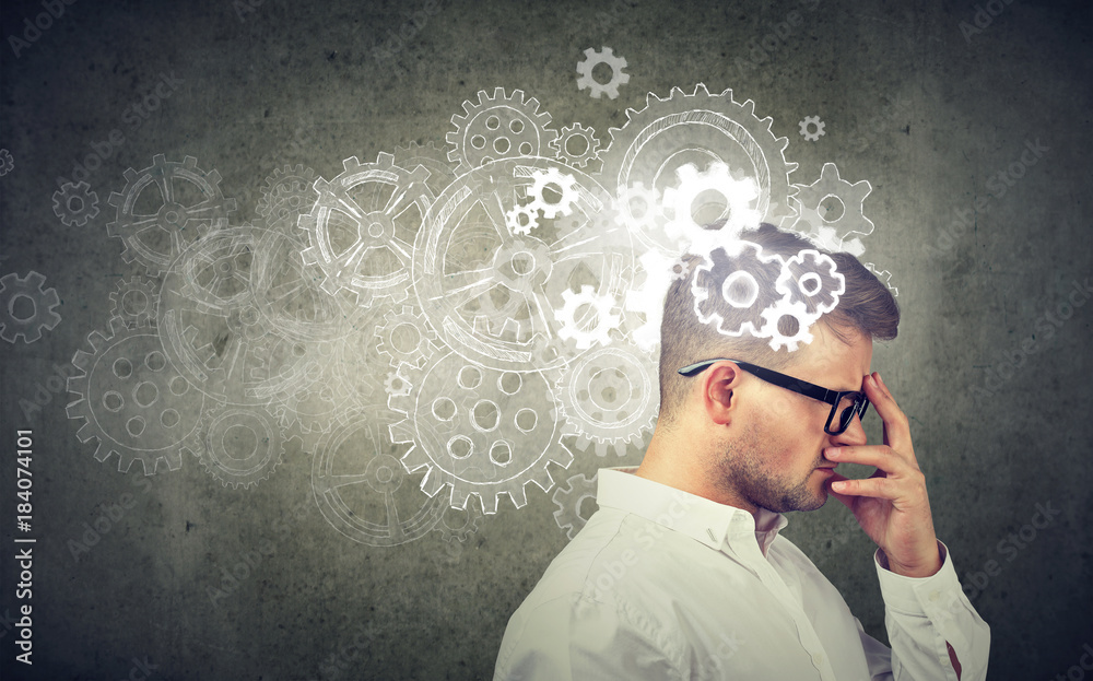 Smart man thinking about technology Stock Photo | Adobe Stock