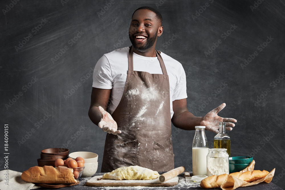 Look at this well made dough! Happy African American male cook or chef ...