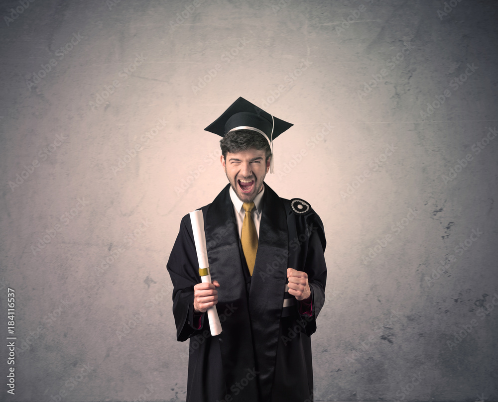 Portrait of a young graduate student on grungy background Stock Photo ...