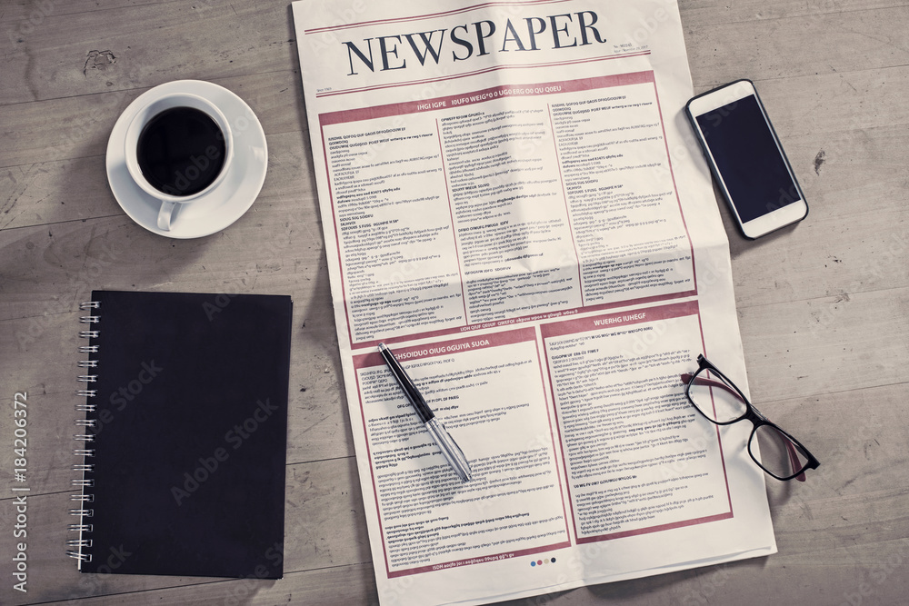 Newspaper on the business table Stock Photo | Adobe Stock