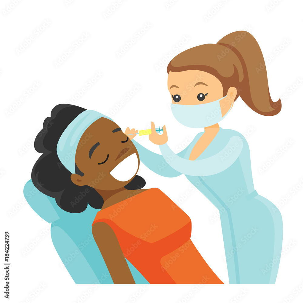African woman getting cosmetic dermal injection in beauty salon ...