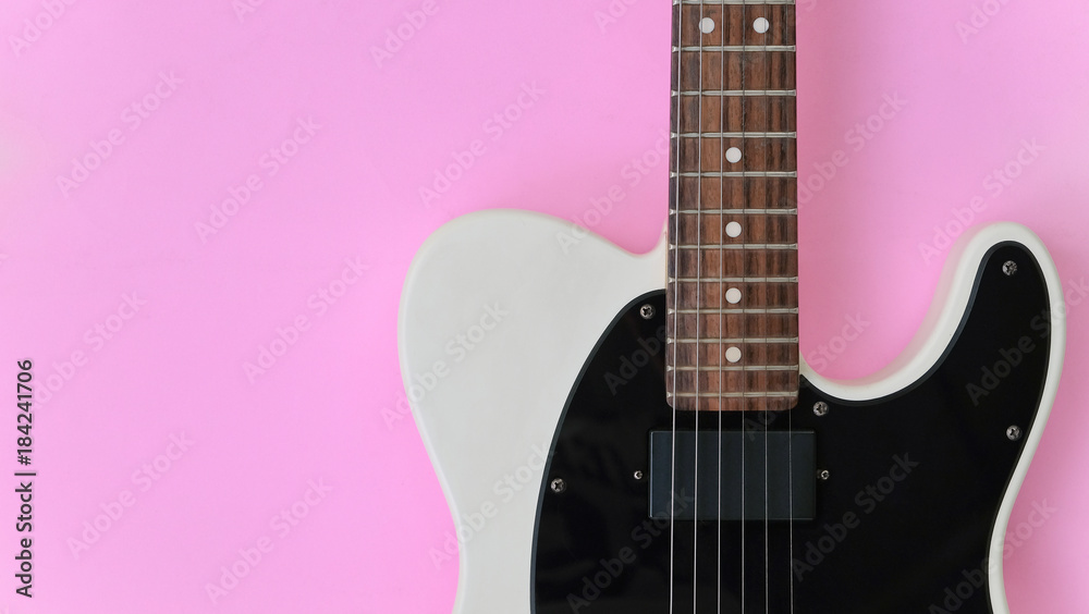 Foto Stock Detail of Electric Guitar on a pink background. | Adobe Stock