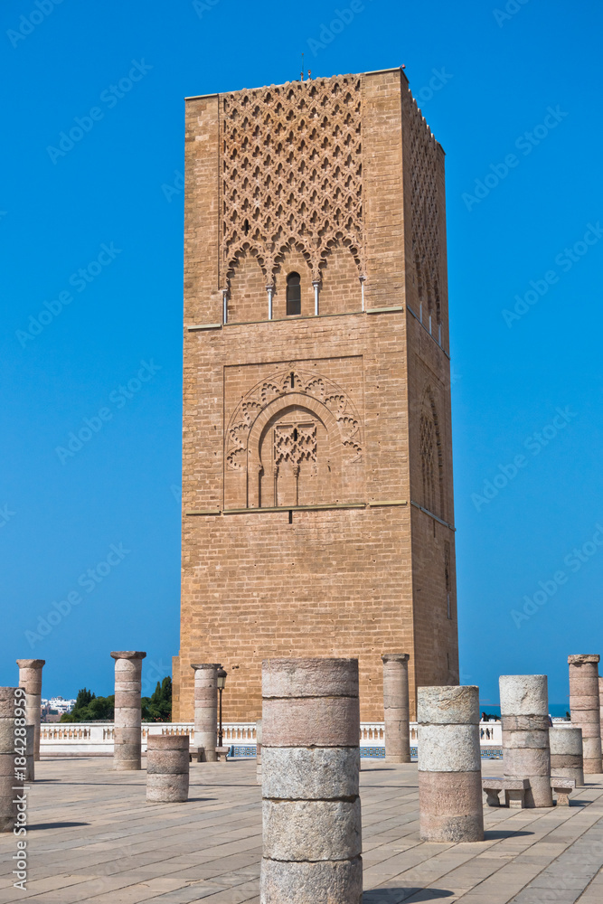 Hassan tower, 12th century minaret with ruins of the greatest mosque in ... Hassan tower, 12th century minaret with ruins of the greatest mosque in ...