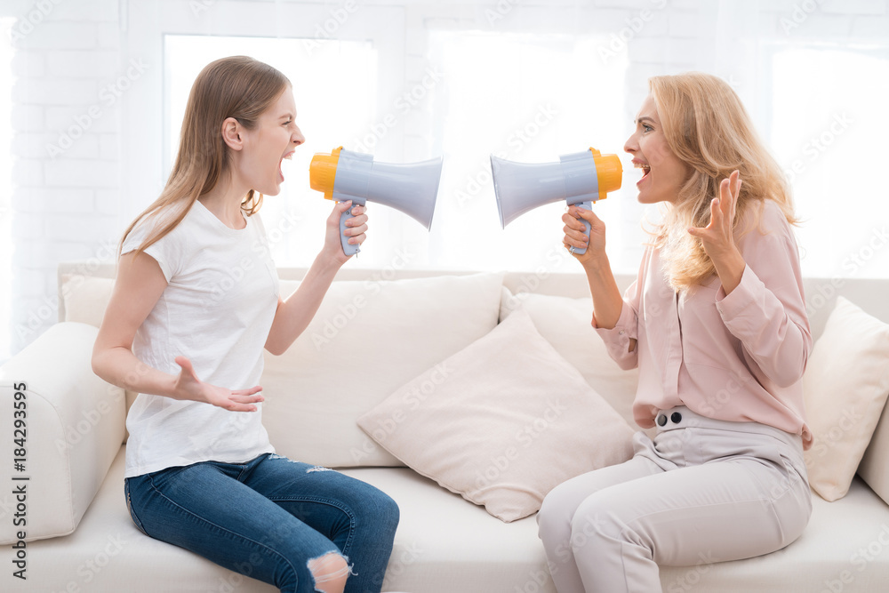 Mom and a teenage daughter are arguing with each other. Stock Photo ...