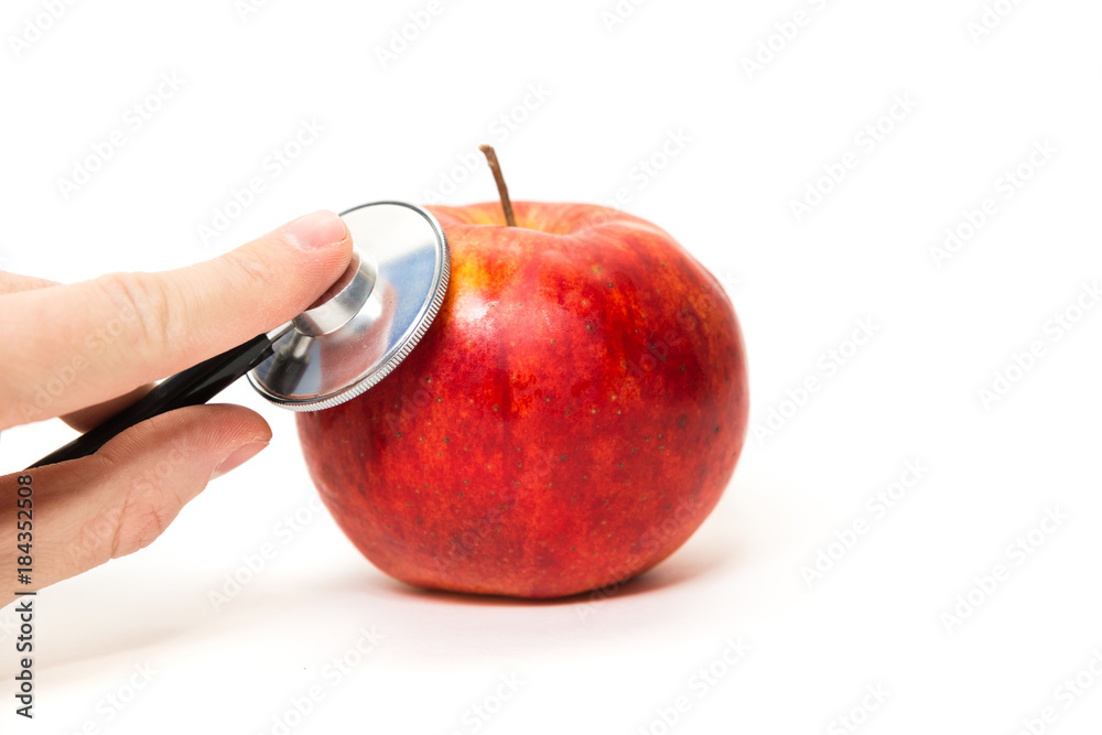 Checking, examination apples, fruit. Man is examining a red apple with ...