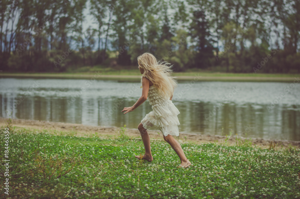 scared child running away in the nature at dark atmosphere Stock Photo ...