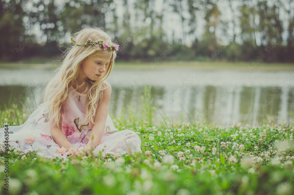 Sad Girl In Field Of Flowers