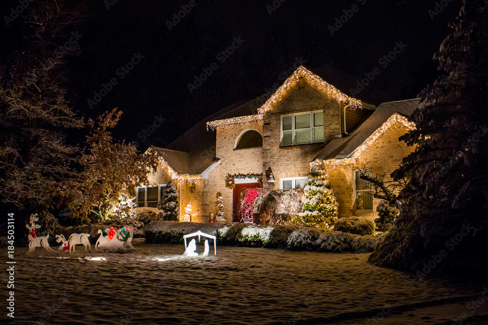 Decorated house for Christmas at night Stock Photo | Adobe Stock
