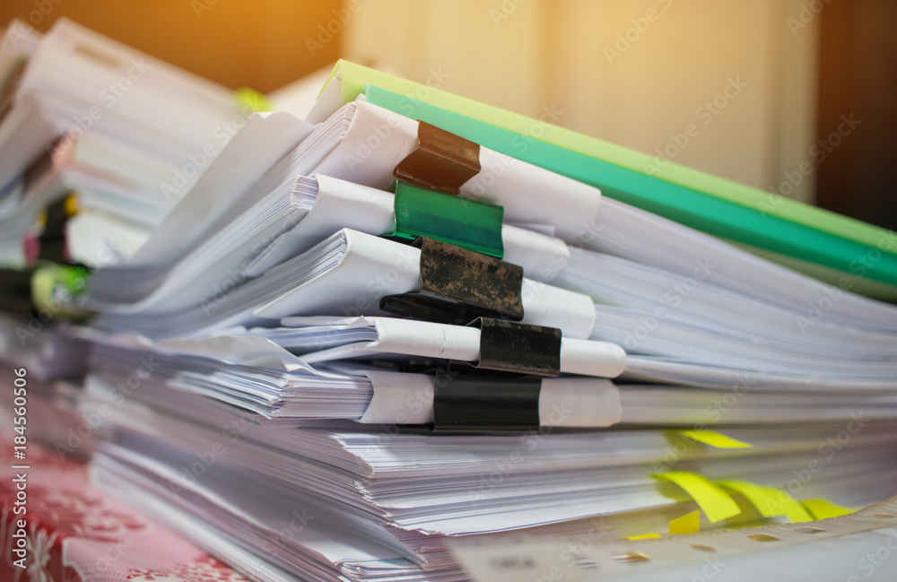 Paper stack, Pile of unfinished documents on office desk related to ...