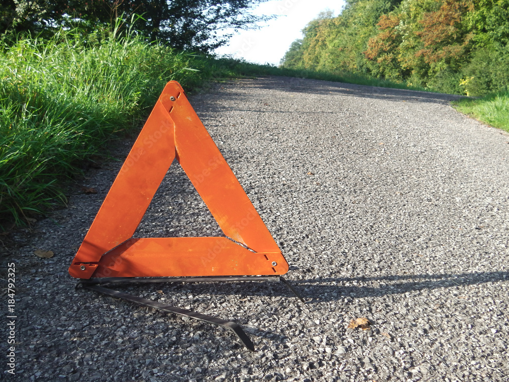 Broken orange triangle warning sign Stock Photo | Adobe Stock