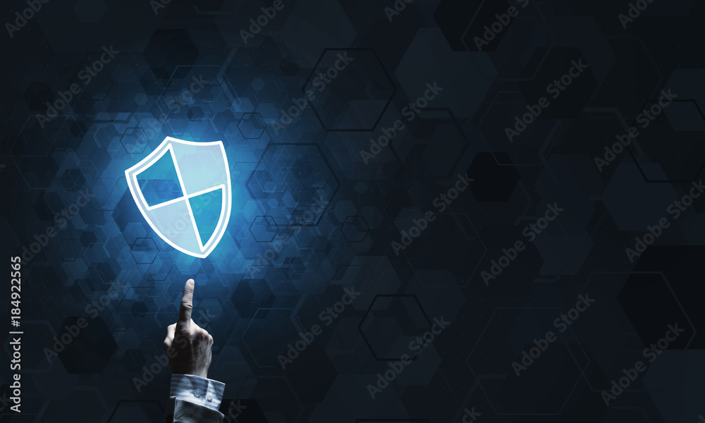 Blue shield icon as symbol of access protection on dark background ...