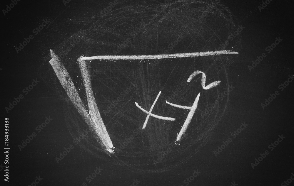 Mathematical formula, equation symbol, sign on chalkboard, blackboard ...