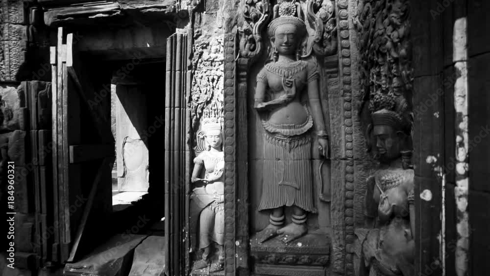 Boom up to reveal three layers of female divinity carvings in high ...