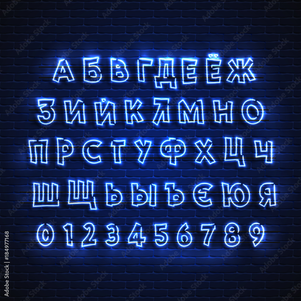 Russian neon font. Glowing alphabet, electric stand, against a brick ...