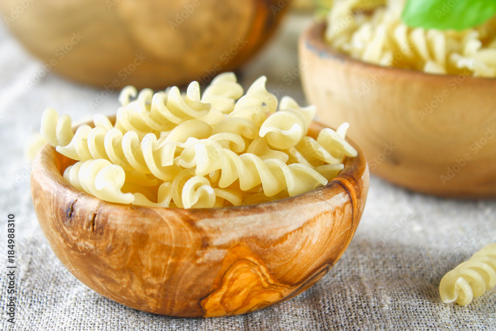 Helix- or corkscrew-shaped pasta. Rotini macaroni. Related to fusilli ...