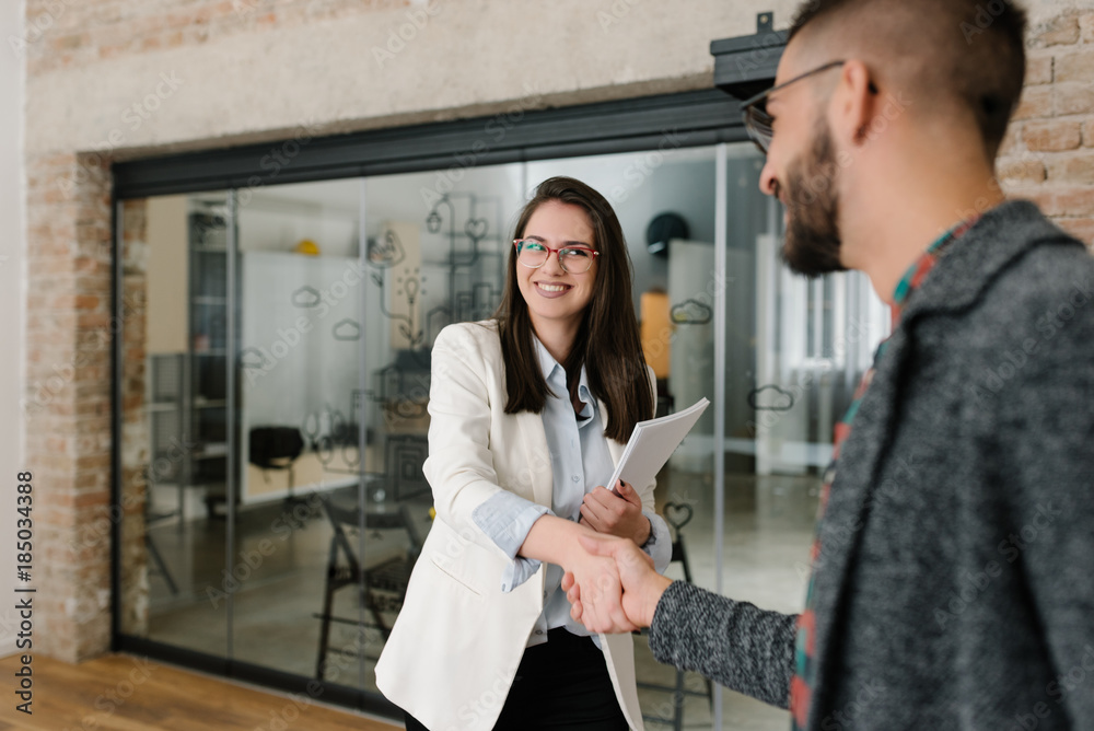 Firm handshake at a job interview Stock Photo | Adobe Stock