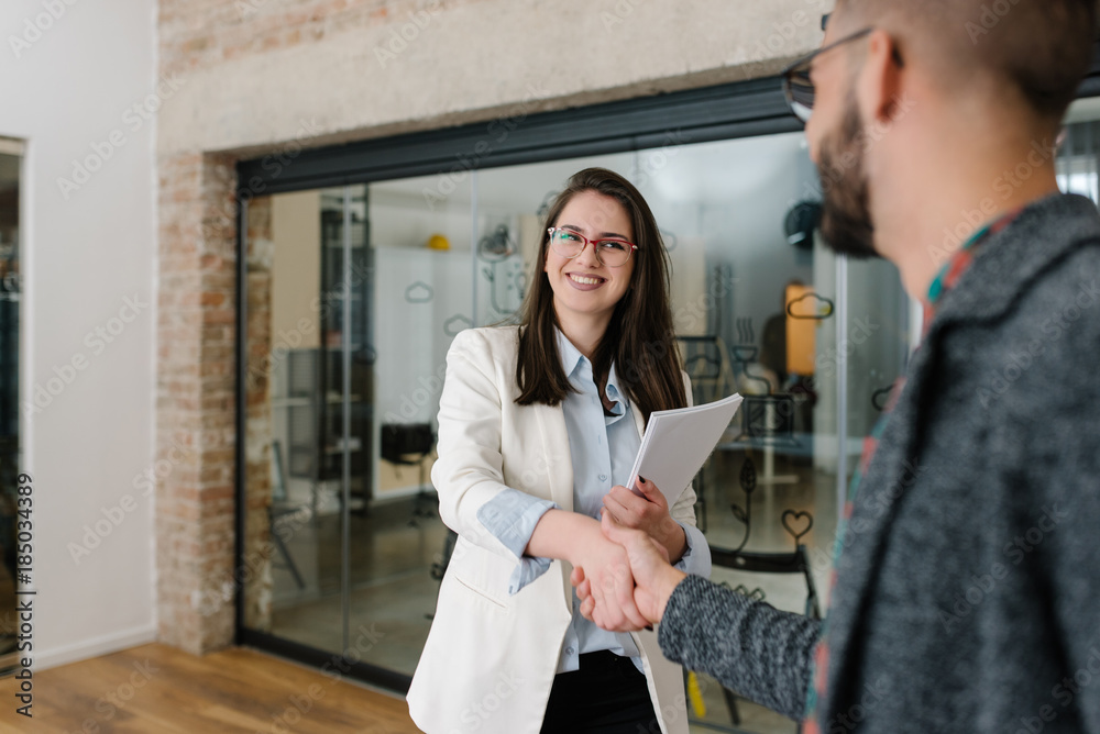 Warm welcome and a handshake opens any job interview Stock Photo ...