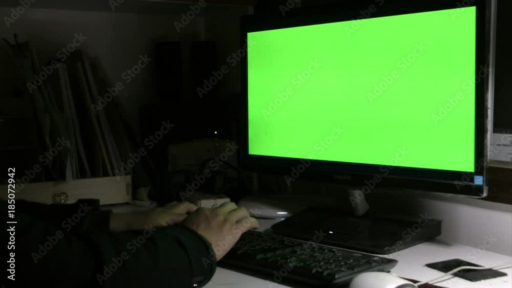 A person is operating a computer at night Stock Video | Adobe Stock