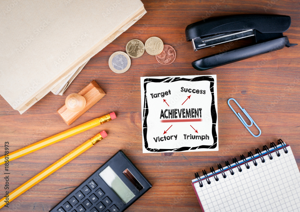achievement concept. Office desk with stationery, chart and ...