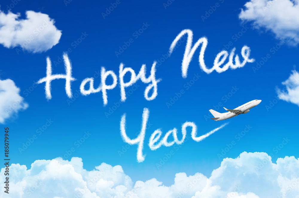 Happy New year concept. Drawing by airplane vapor contrail in sky ...