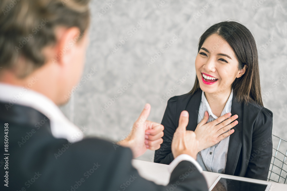 Boss/Business man employer admires young Asian business woman/staff ...