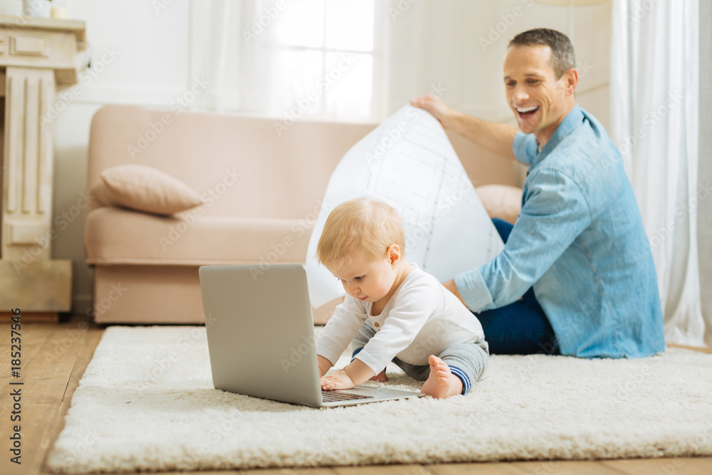 Progressive baby. Funny cute progressive baby feeling busy while trying ...