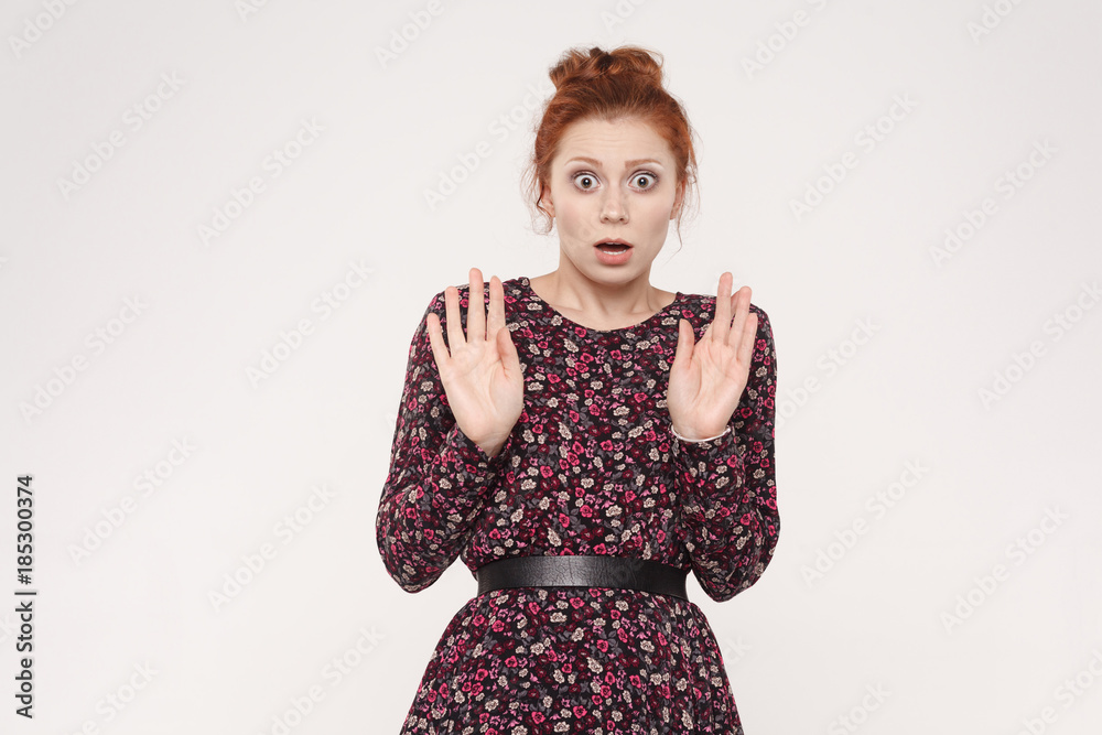 Human face expressions and emotions. Redhead young woman hands up and ...