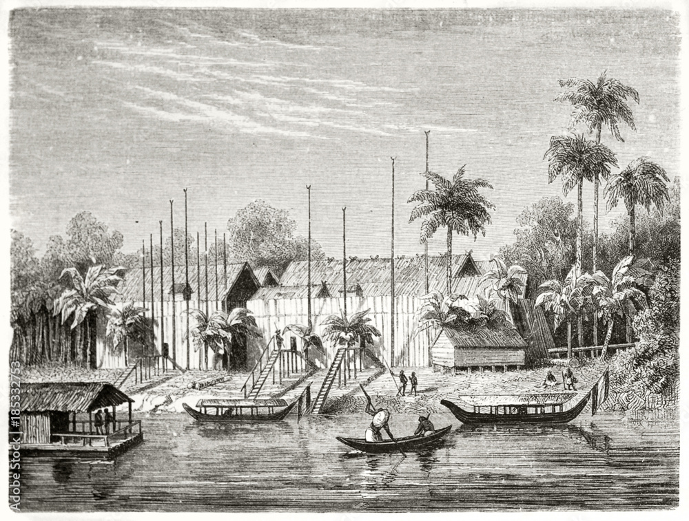 Ancient river in the jungle flowing near to a native Dayak people ...