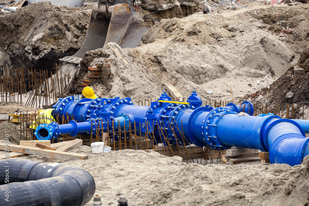 Workers laid water system pipeline at construction site Stock Photo ...