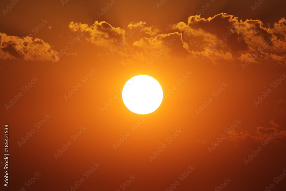 big bright sun on sky background Stock Photo | Adobe Stock